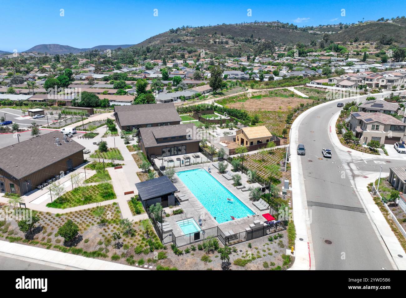 Aerial video of recreational facilities with pool in private ...