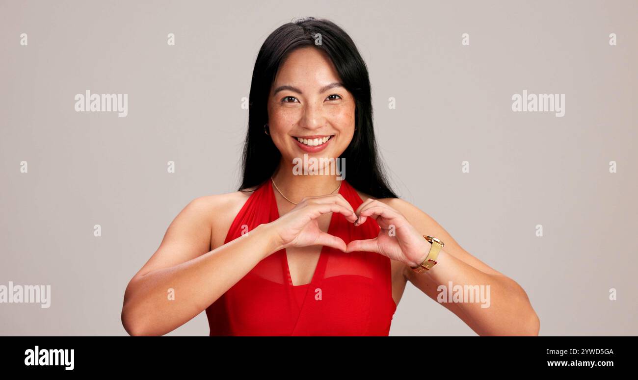 Happy woman, portrait and heart hands, love sign or gesture for romance ...