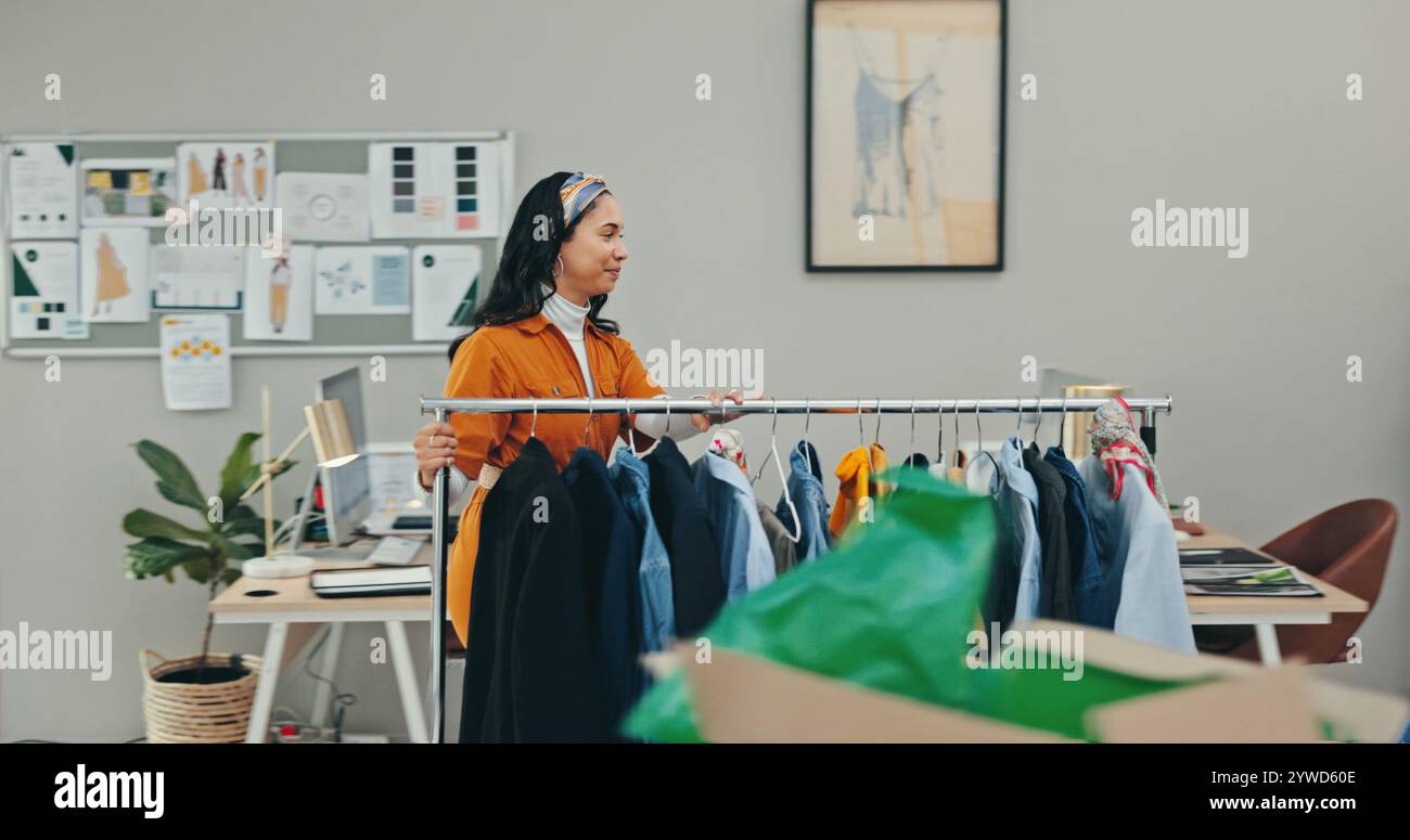 Clothing rack, creative and wardrobe with fashion designer woman in ...