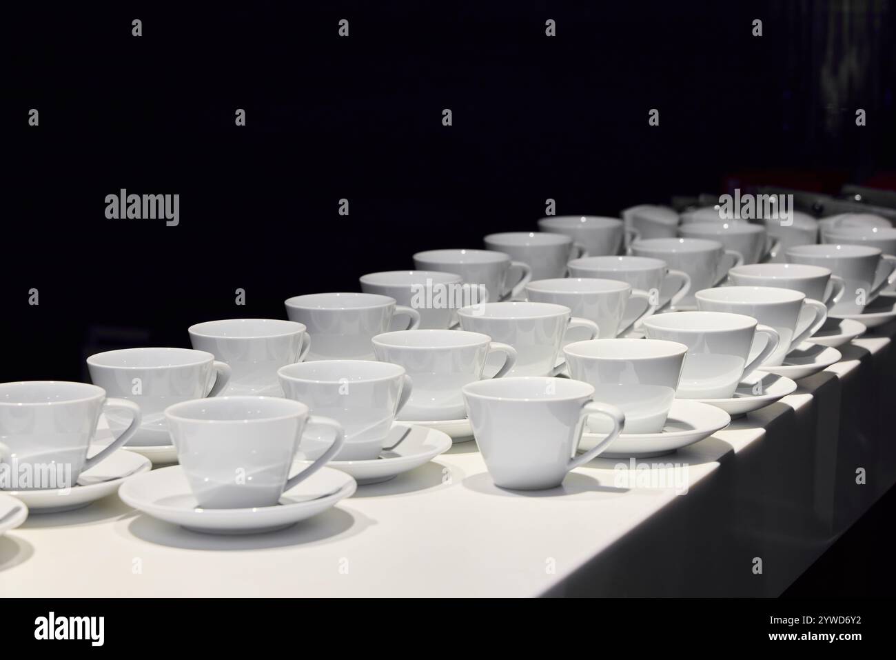 An Array of Elegant White Coffee Cups Beautifully Arranged on Display ...