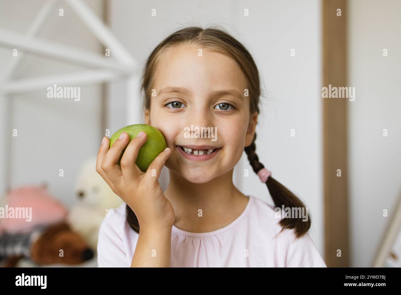 Little Caucasian girl with missing teeth from falling out milk teeth ...