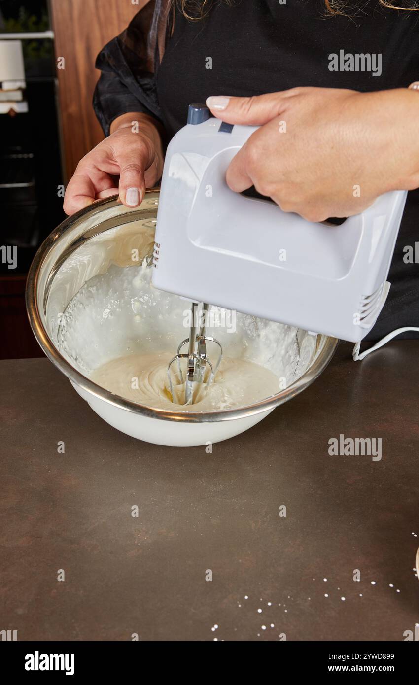 Granola mixing process hi-res stock photography and images - Alamy