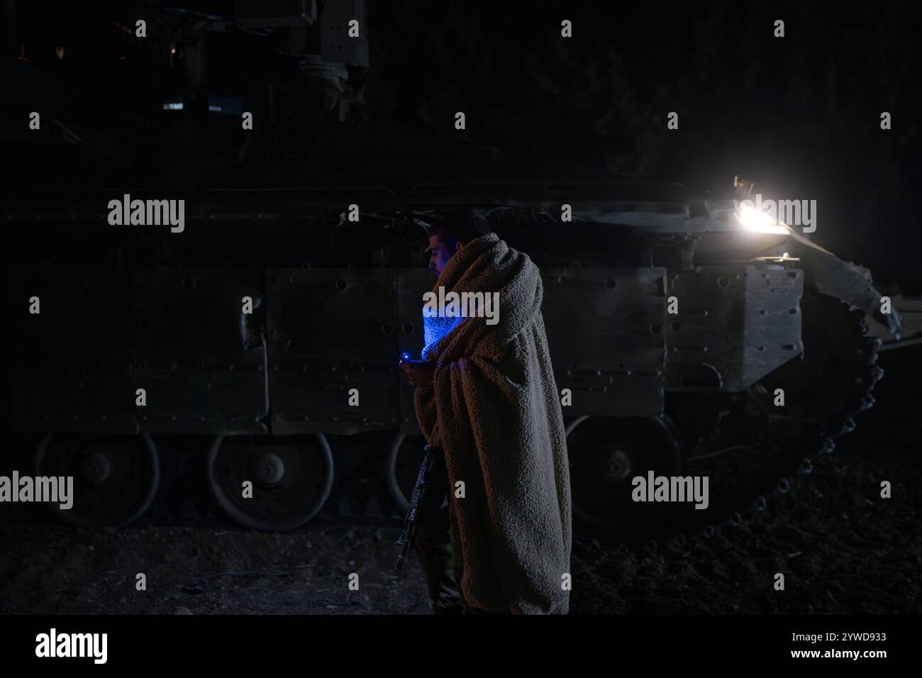 11 December 2024, Israel, Yuval: Israeli soldiers gather as they return ...