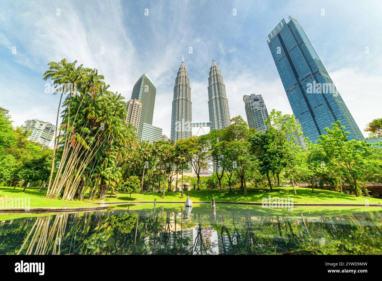 Scenic artificial lake at the KLCC Park and skyscrapers Stock Photo - Alamy