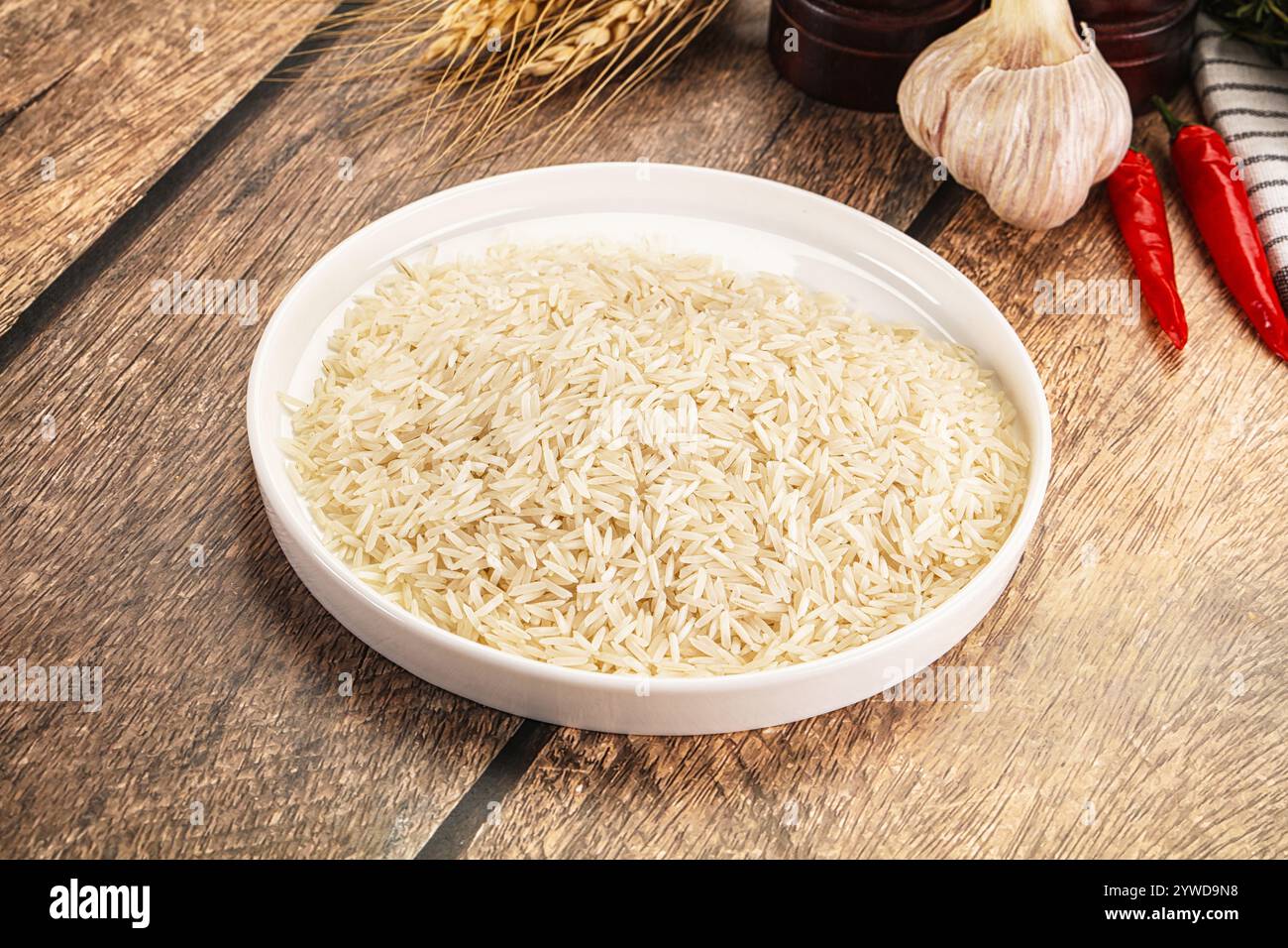 Indian cuisine - raw basmati rice for steam Stock Photo - Alamy