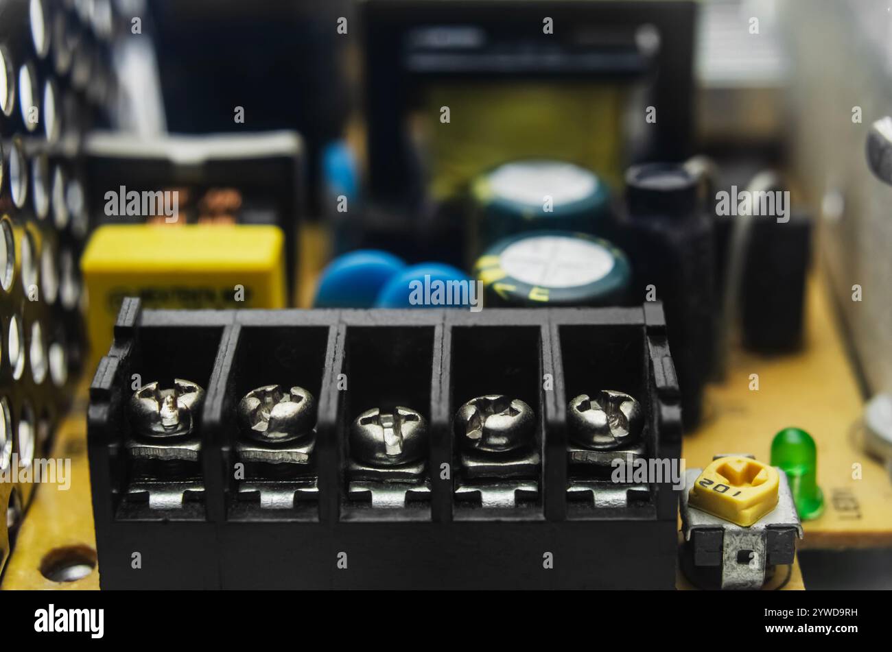 Close-up of an AC DC power supply with transformer and electronic ...