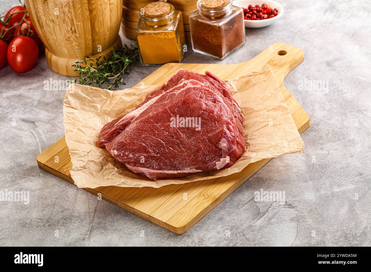 Raw beef meat piece for cooking Stock Photo - Alamy