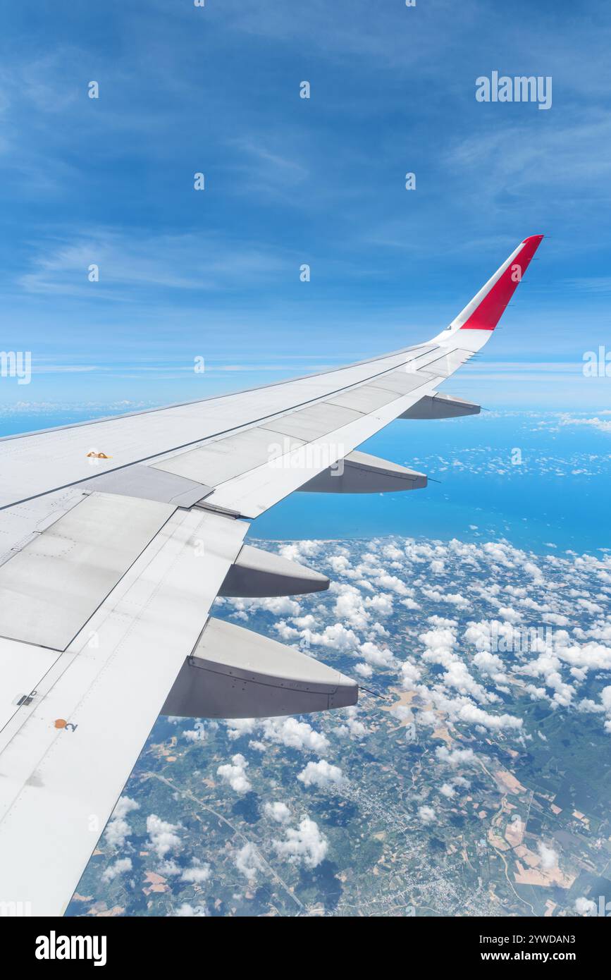 Awesome view of the Earth under the airplane wing Stock Photo - Alamy