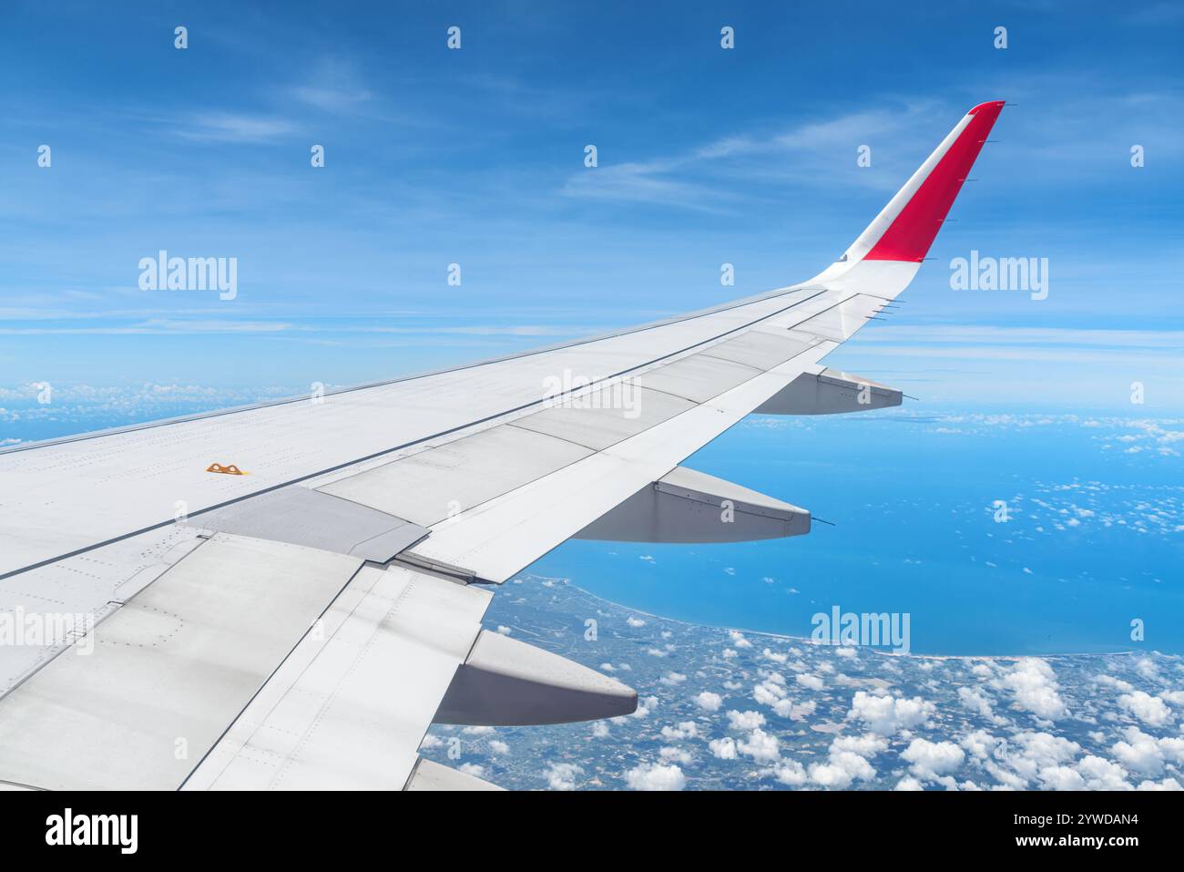 Awesome view of the Earth under the airplane wing Stock Photo - Alamy