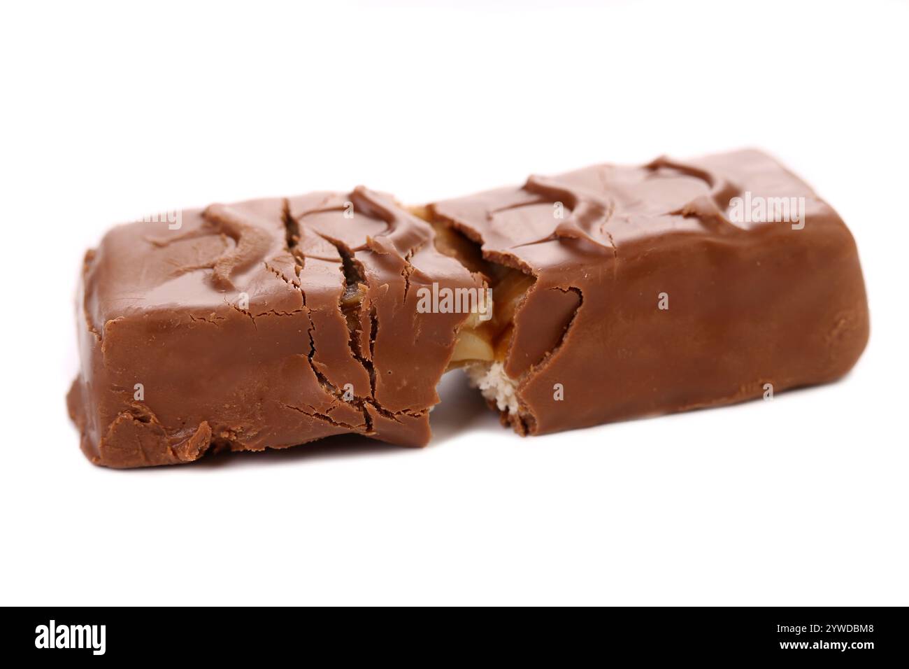 Broken bar of chocolate with filling. Close up. White background Stock ...