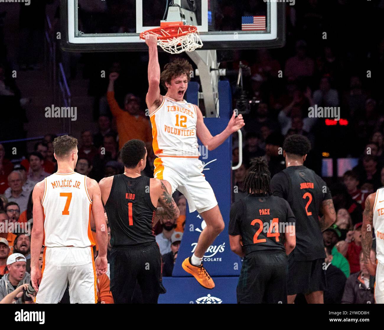 Tennessee Volunteers forward Cade Phillips (12) reacts after a dunk ...