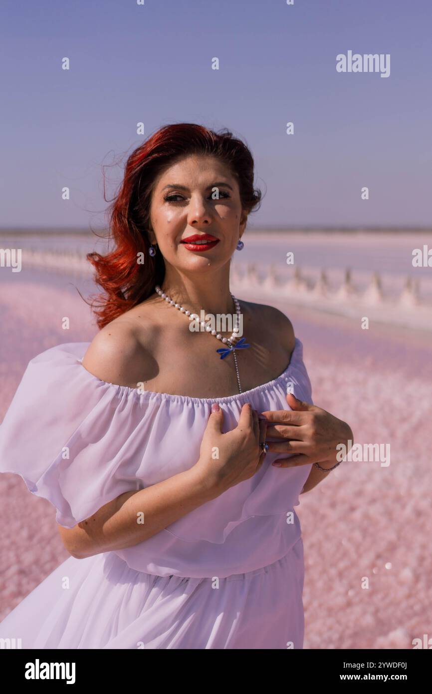 Woman Pink Salt Lake Summer Fashion - A woman in a white dress poses in ...