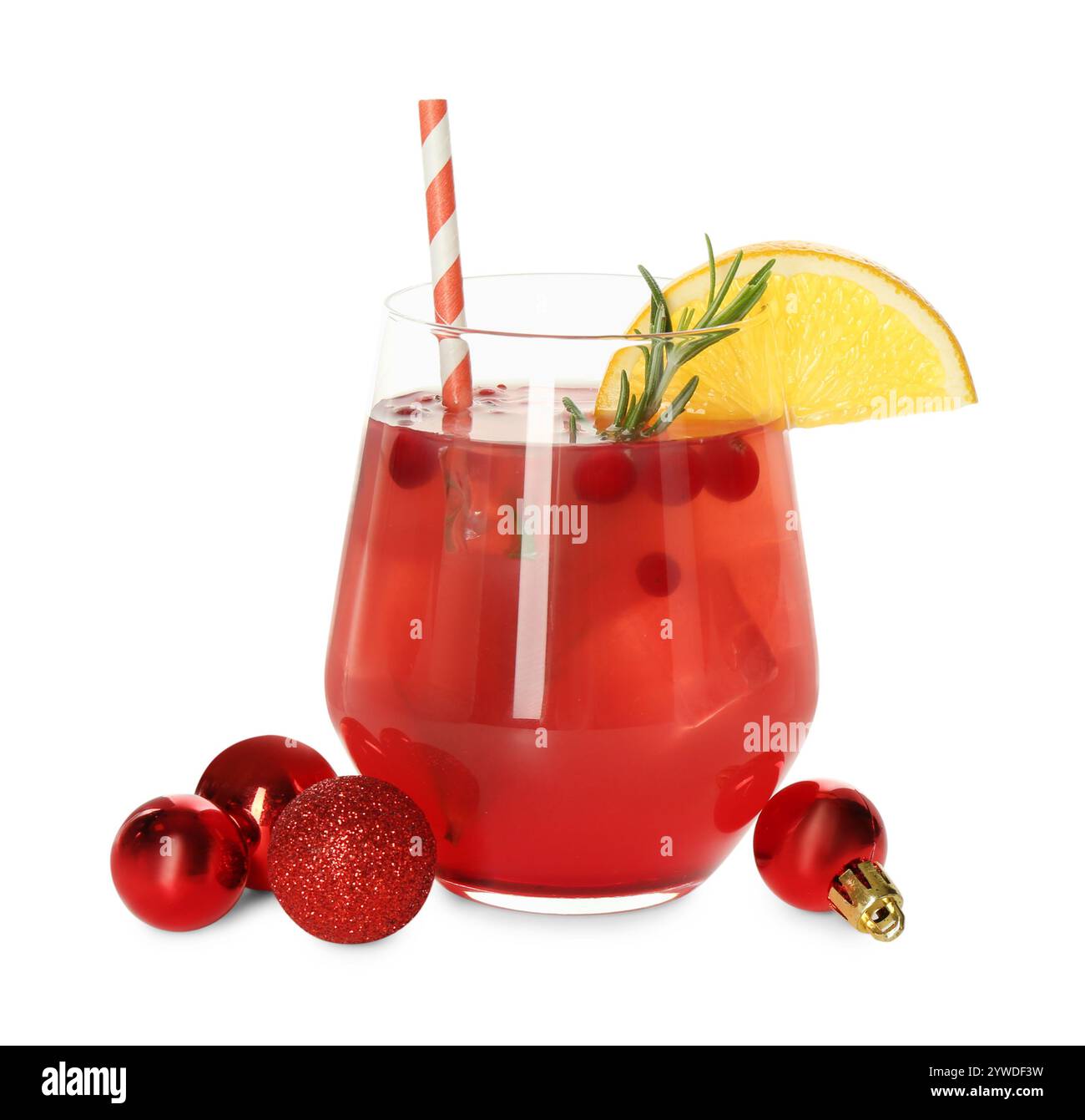 Tasty Christmas cocktail in glass and baubles isolated on white Stock ...