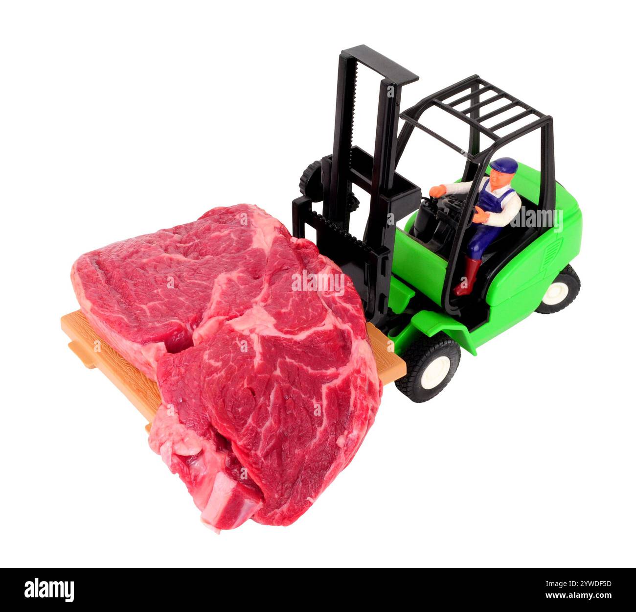 Toy forklift truck carrying a real fresh raw rib eye steak isolated on ...
