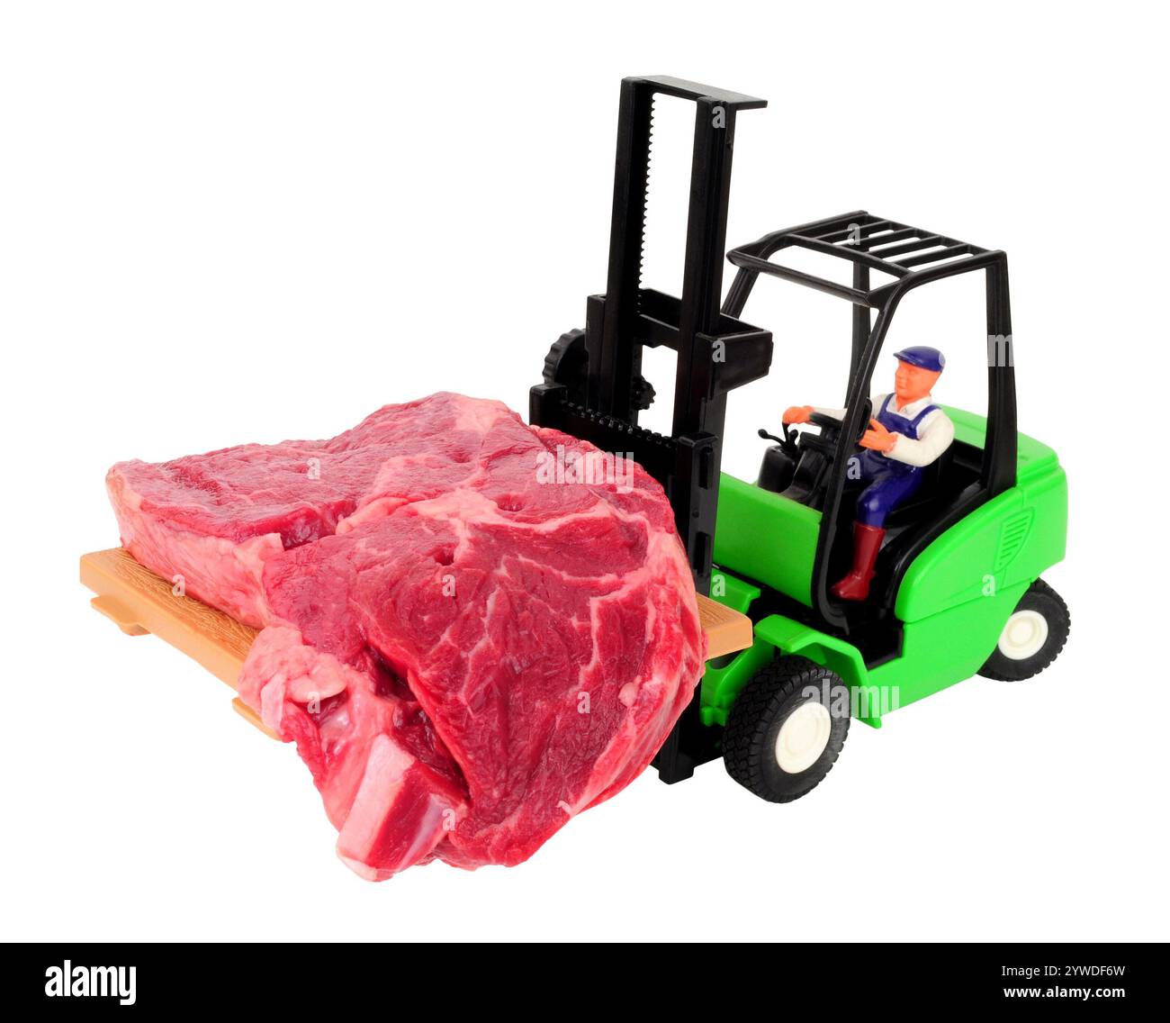 Toy forklift truck carrying a real fresh raw rib eye steak isolated on ...