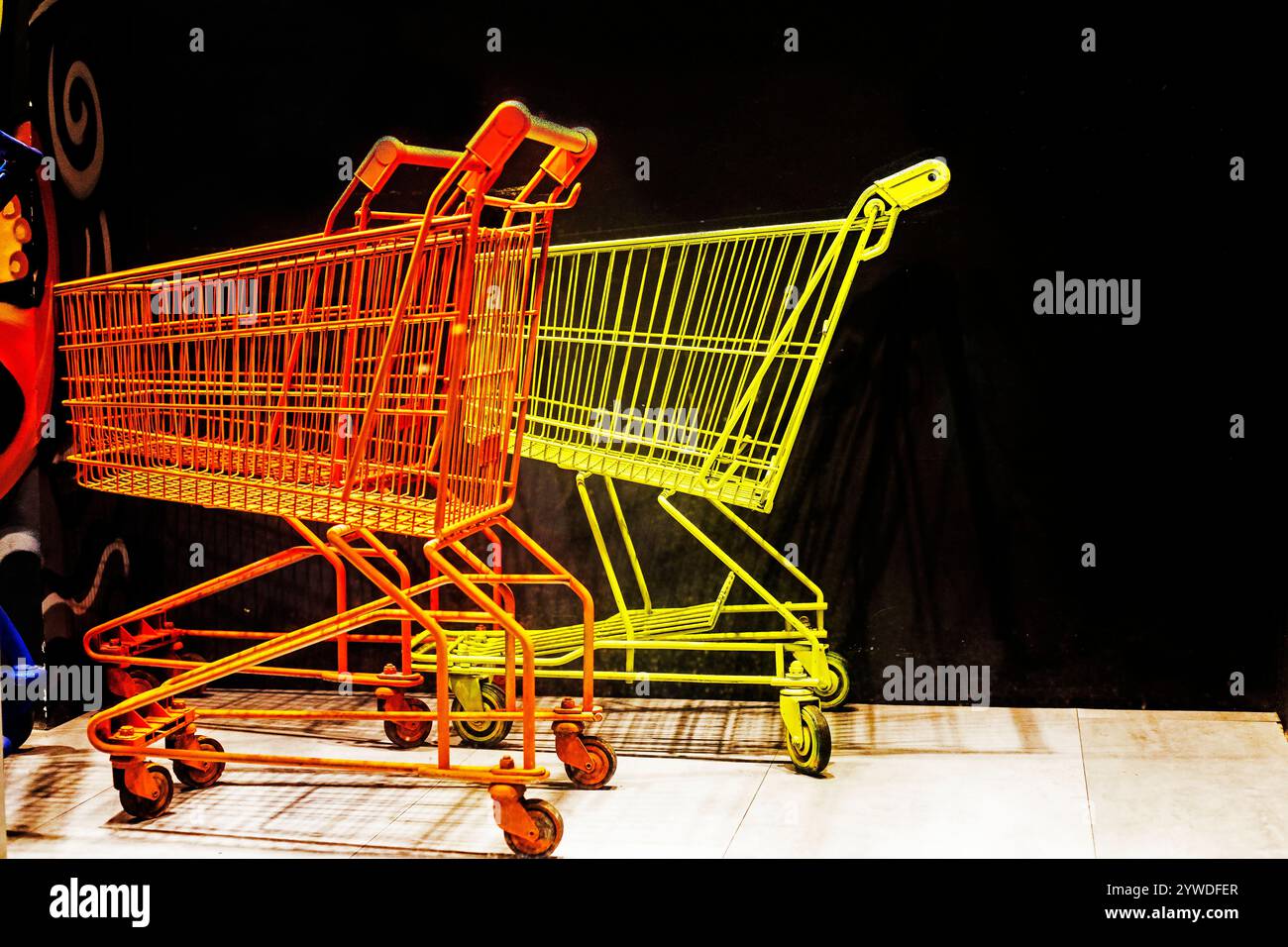 grocery carts in front of the supermarket entrance Stock Photo - Alamy