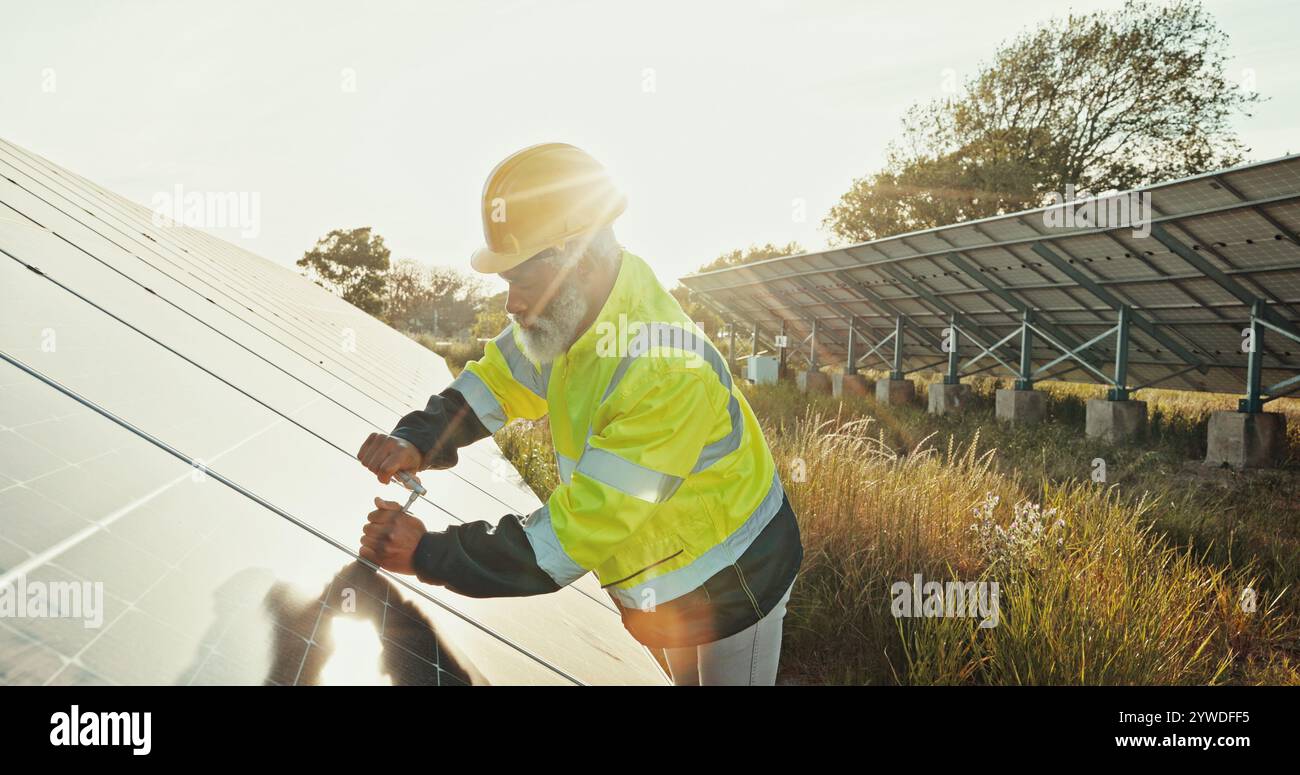 Solar panels, install and grid with black man in nature for ...
