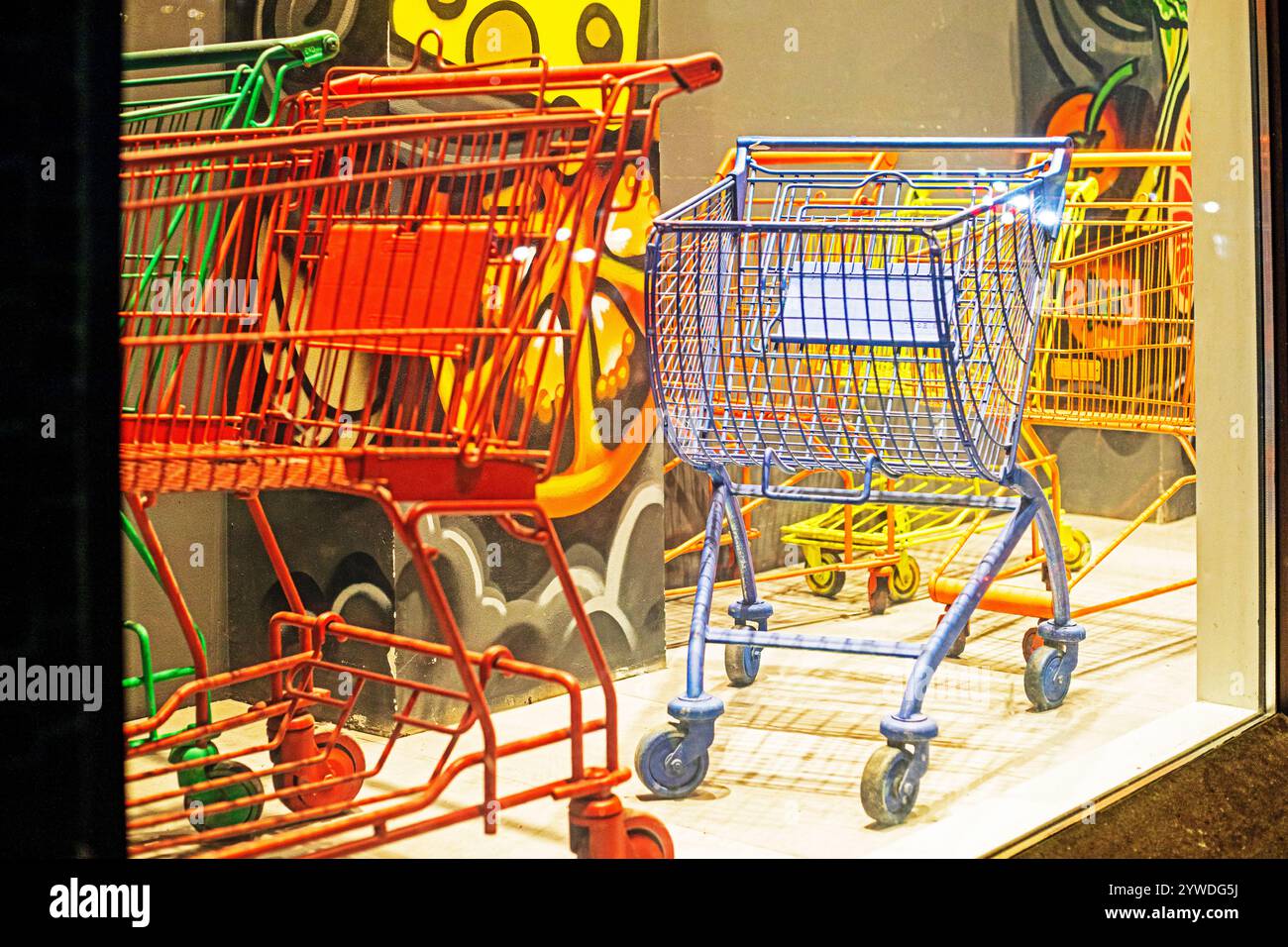 grocery carts in front of the supermarket entrance Stock Photo - Alamy