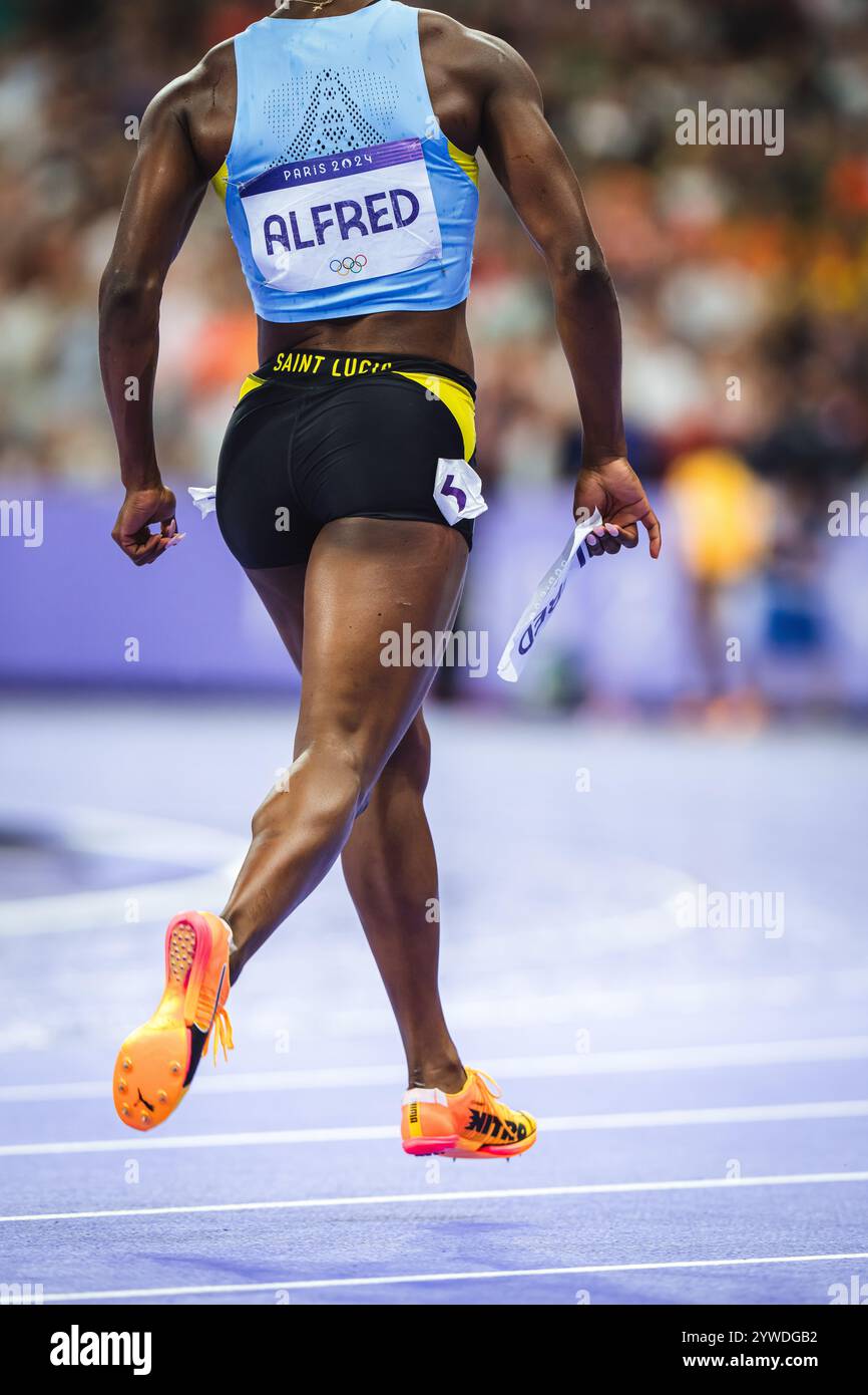 Julien Alfred winning in the 100 meters relay at the Paris 2024 Olympic ...