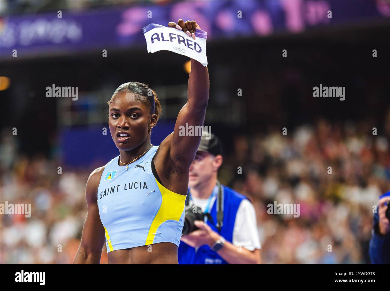 Julien Alfred winning in the 100 meters relay at the Paris 2024 Olympic ...