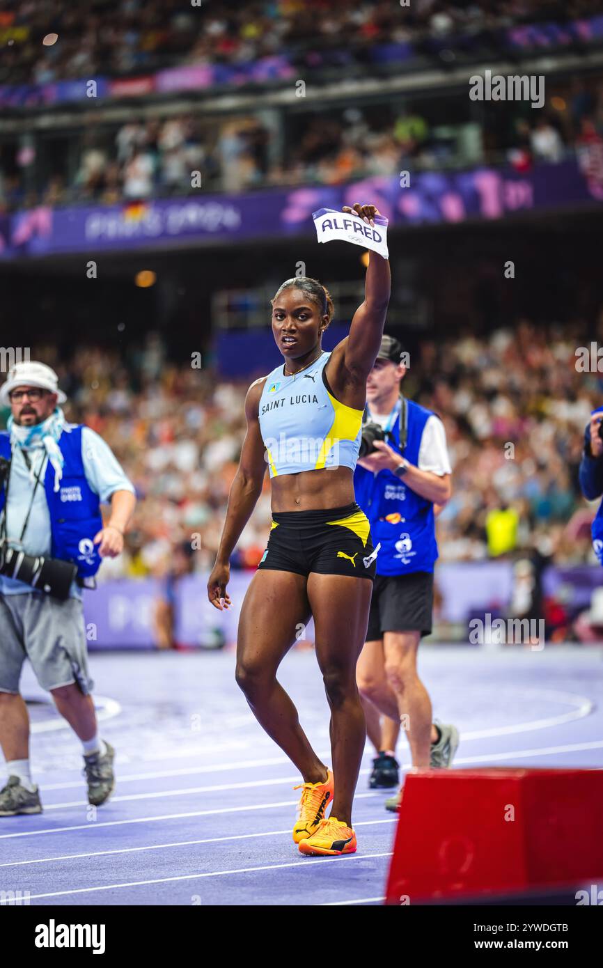 Julien Alfred winning in the 100 meters relay at the Paris 2024 Olympic ...
