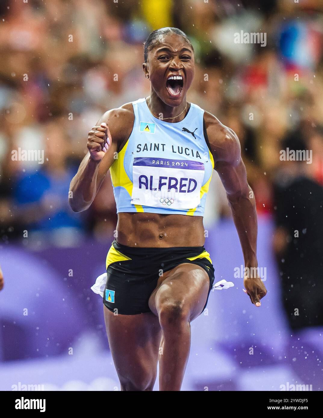 Julien Alfred winning in the 100 meters relay at the Paris 2024 Olympic ...
