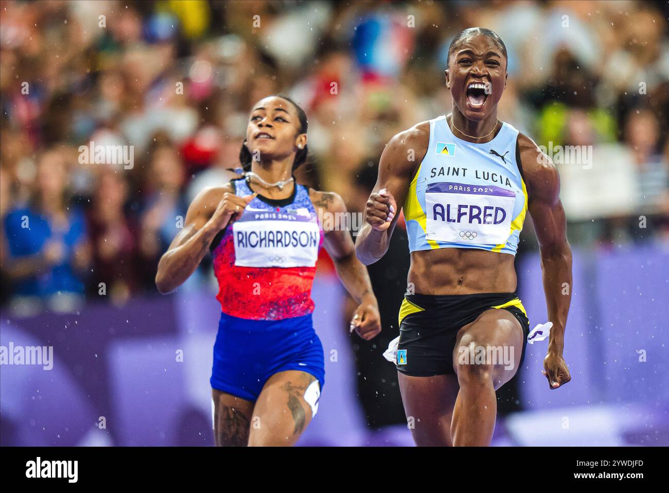 Julien Alfred winning in the 100 meters relay at the Paris 2024 Olympic ...