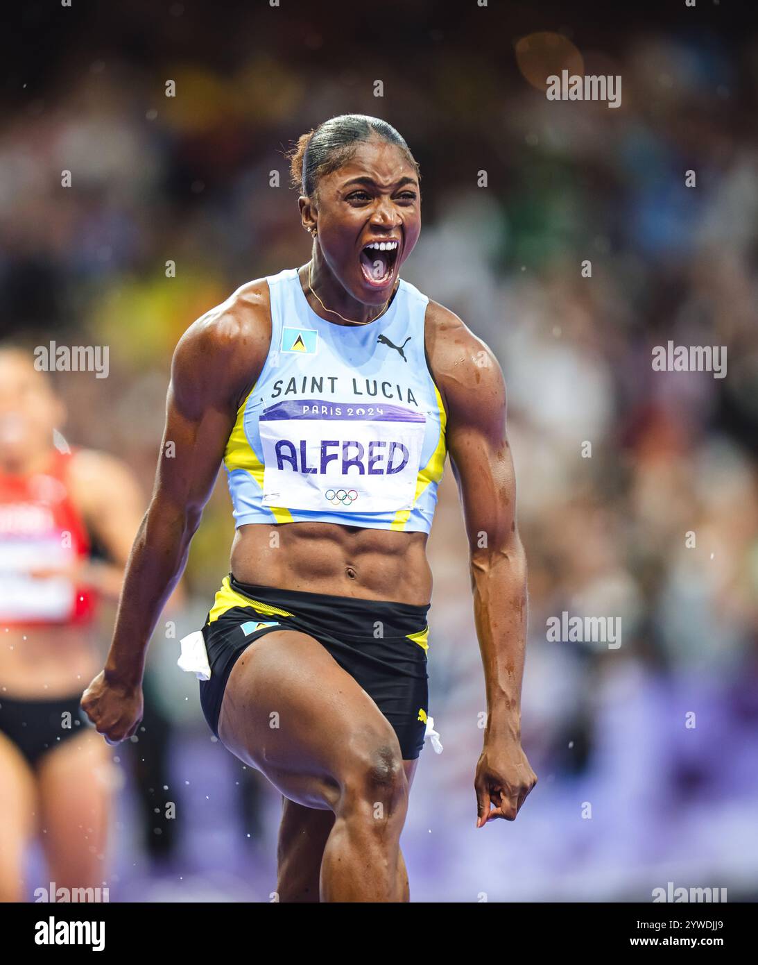 Julien Alfred winning in the 100 meters relay at the Paris 2024 Olympic ...