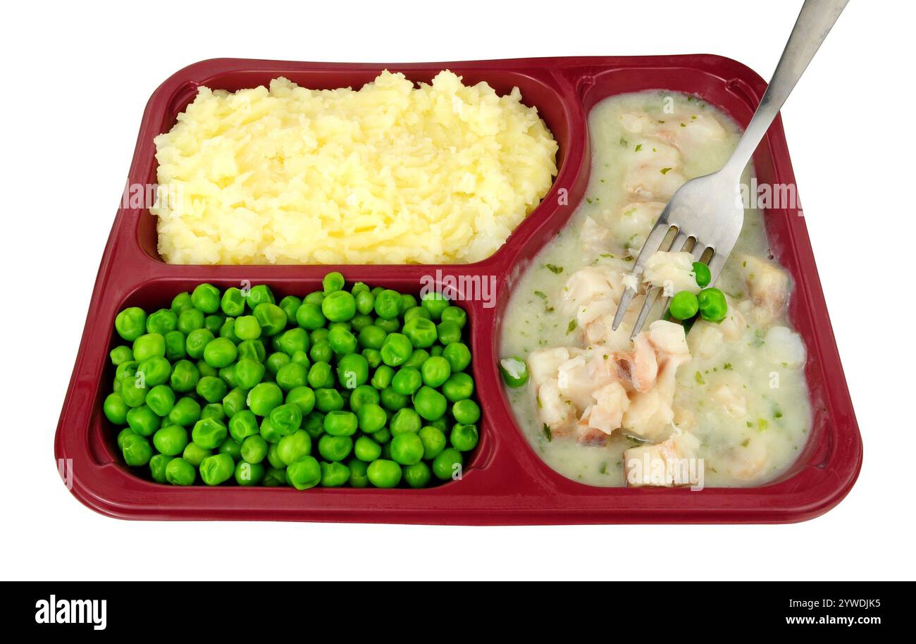 Cod fish in parsley sauce ready meal with mashed potato and green peas ...