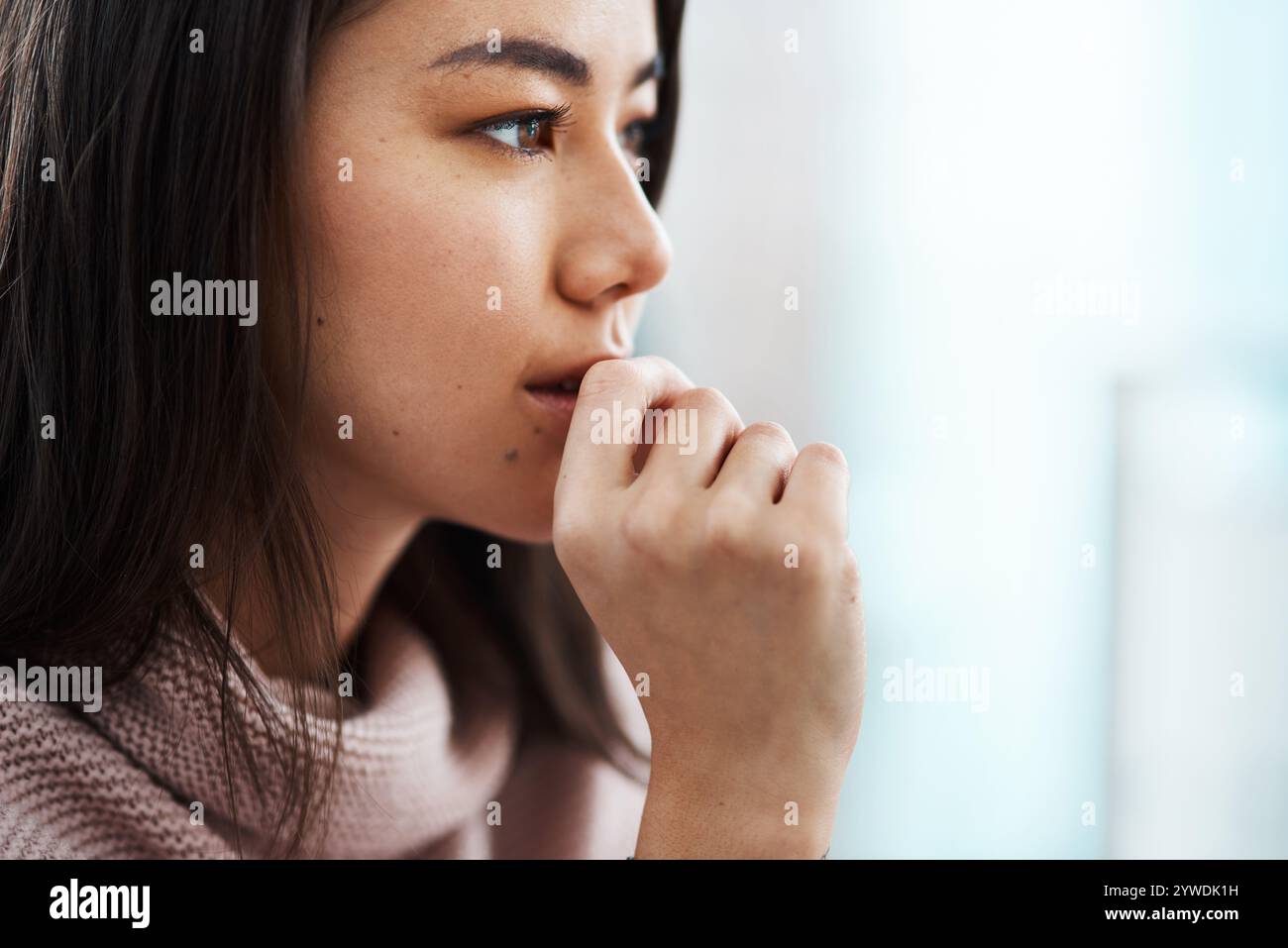 Woman, thinking and fear in home with anxiety, stress and biting nails ...