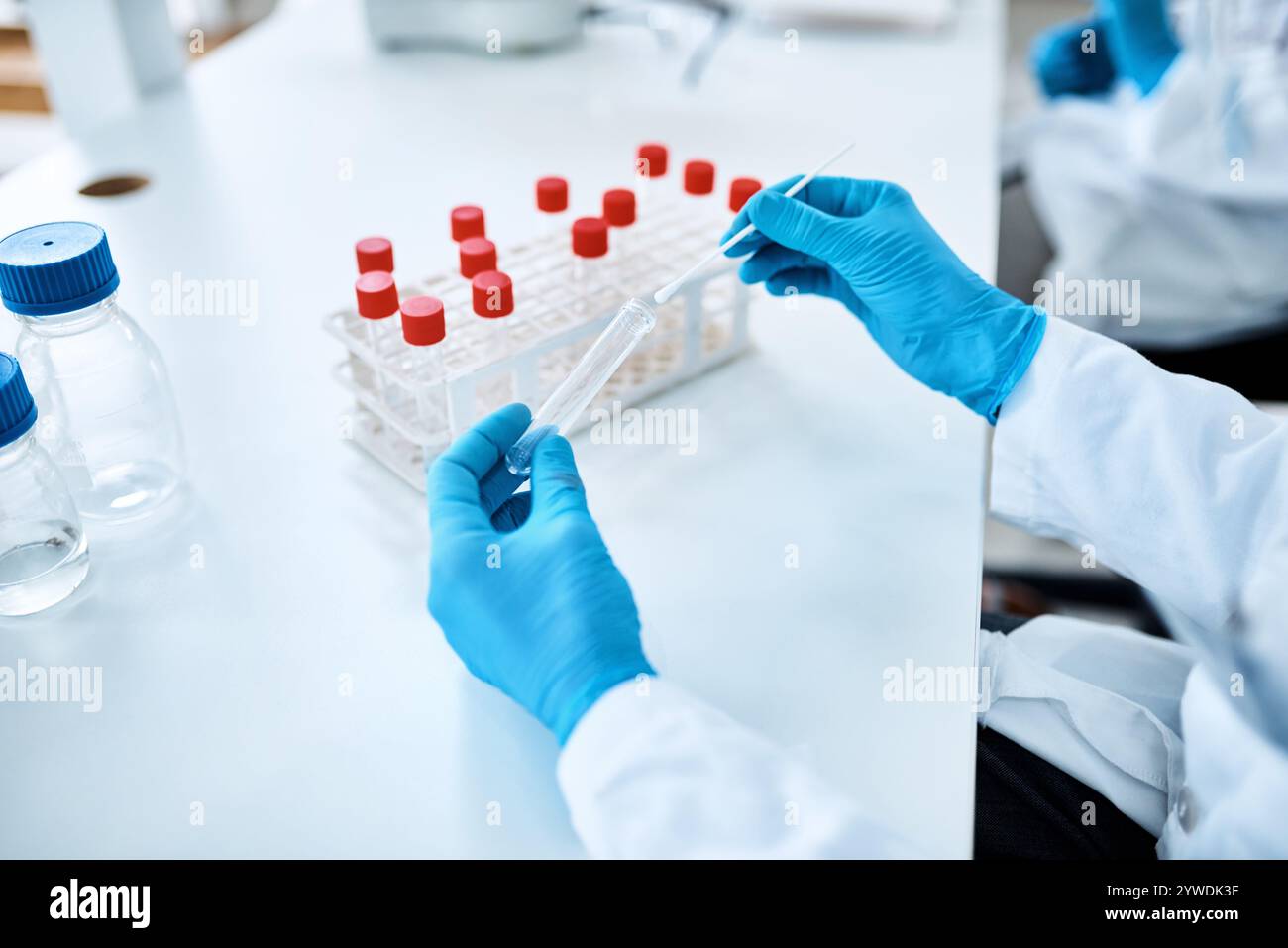 Hands, ppe and sample in science laboratory with gloves for testing ...