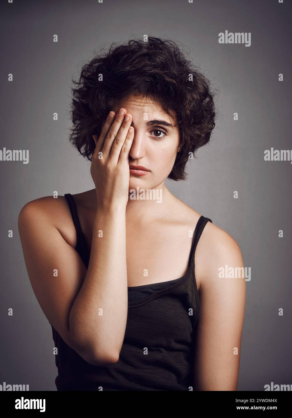 Tired, insomnia and portrait of woman in studio with upset, annoyed and ...