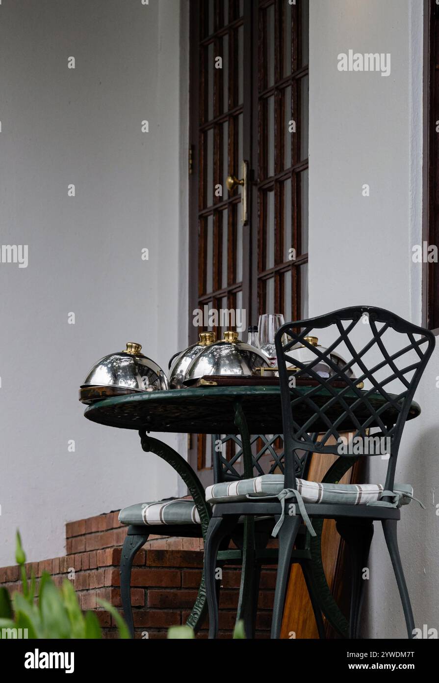 cleaning of hotel rooms and villas. plates covered with metal lids for ...