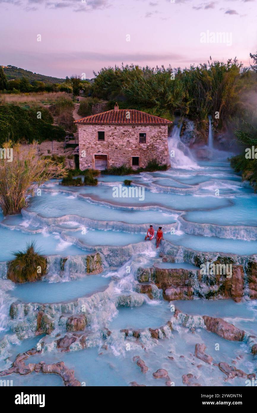 Visitors unwind in the enchanting thermal waters of Saturnia ...