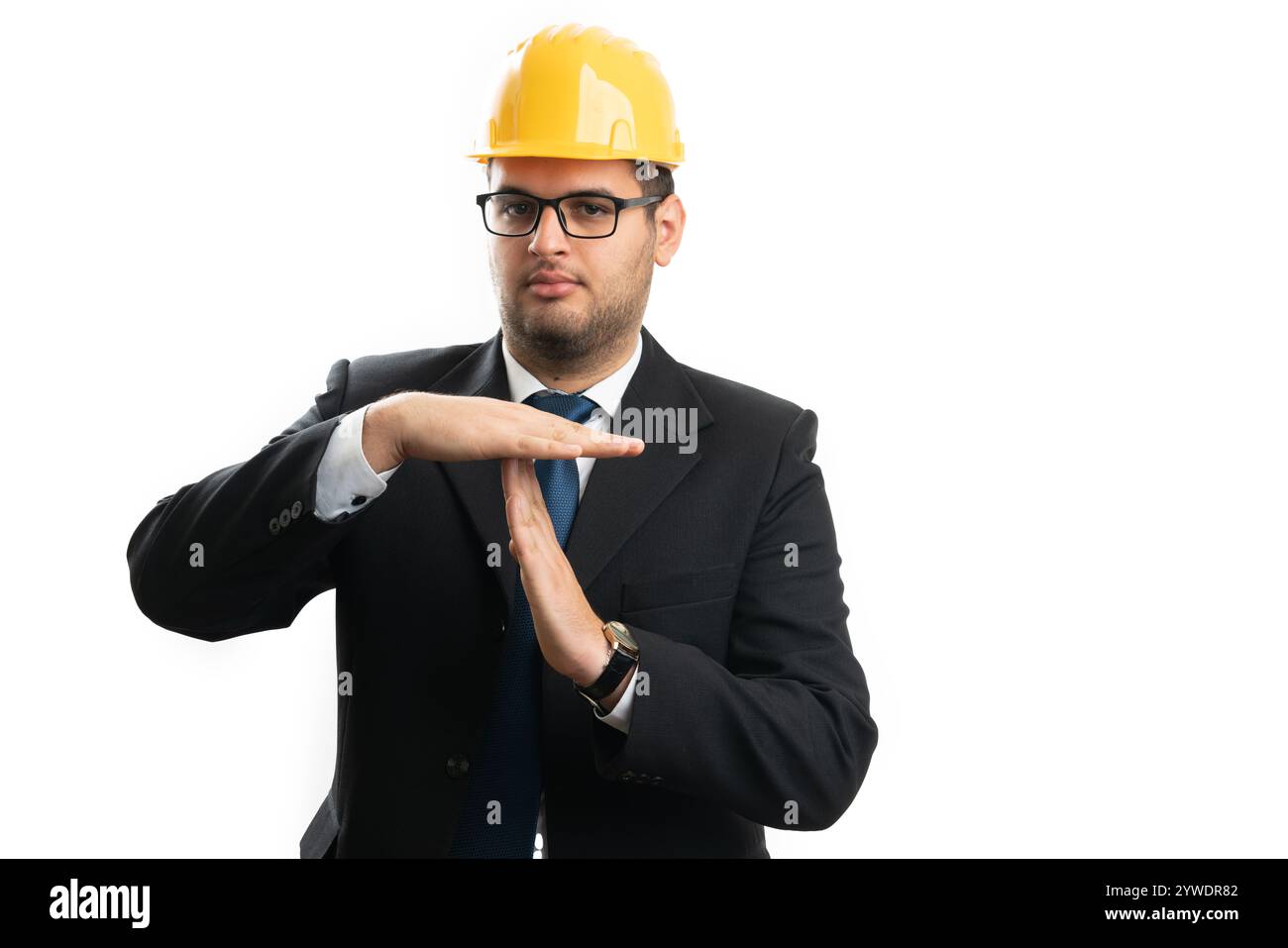Adult male engineer or architect wearing yellow hardhat for safety ...