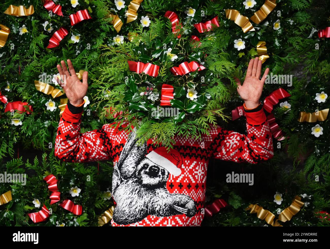 Stephen Roxburgh displays Christmas wreaths after making them at the ...