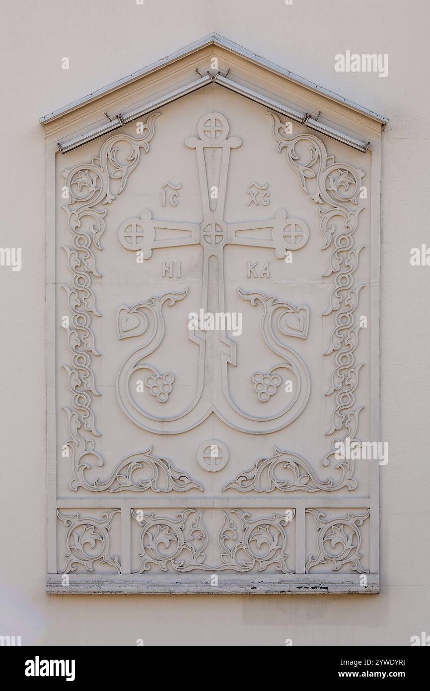 Bas-relief in the form of an Orthodox cross framed by an ornate pattern ...