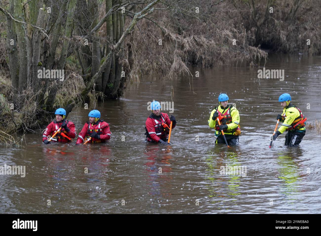 Members of a search and rescue team during a search operation at ...