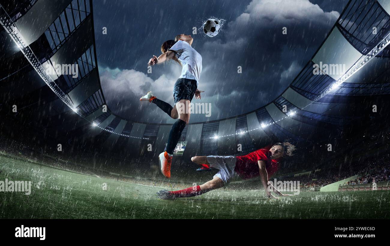 Female soccer player jumping gracefully to strike ball mid-air ...