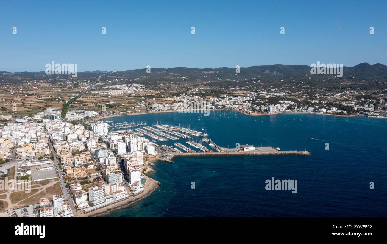 Aerial drone photo of a beach in the town of Sant Antoni de Portmany on ...