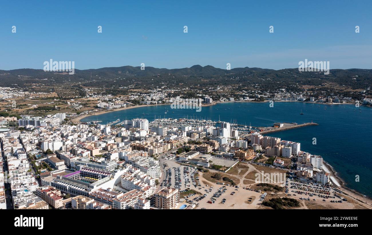 Aerial drone photo of a beach in the town of Sant Antoni de Portmany on ...