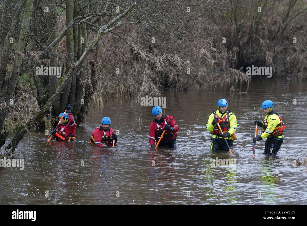 Members of a search and rescue team during a search operation at ...