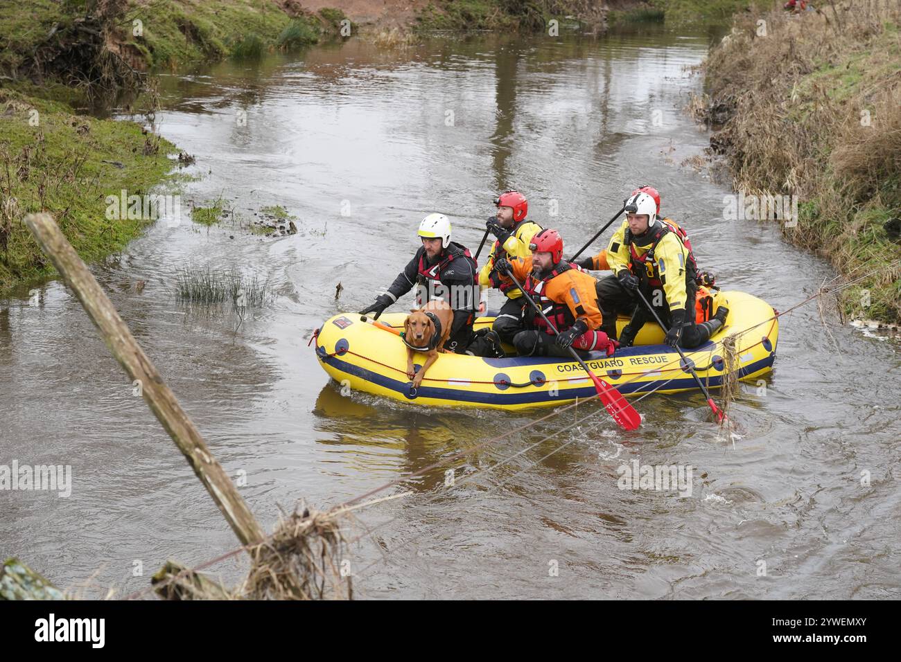 Members of a search and rescue team during a search operation at ...