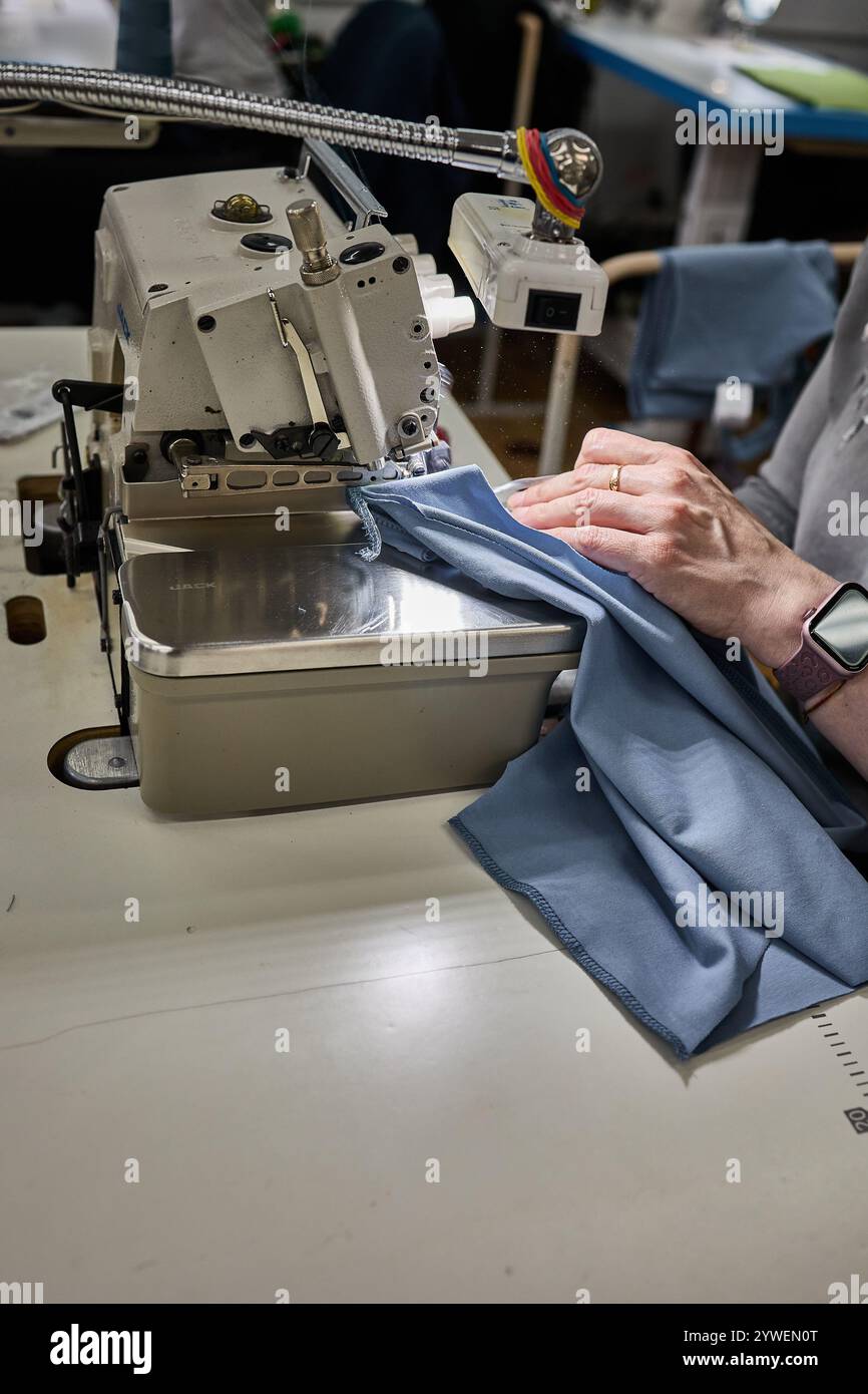 Industrial Overlock Machine in Garment Production Stock Photo - Alamy