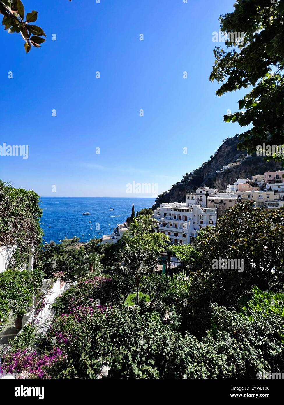 Coastal scene features the sparkling blue Mediterranean sea, lush green ...
