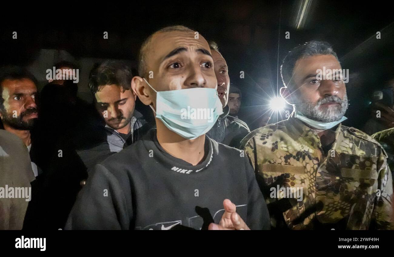 Near Damascus, Syria. 09th Dec, 2024. A former inmate speaks outside ...