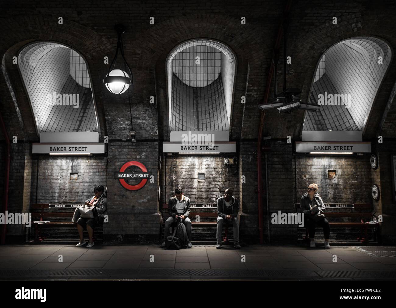 People waiting at Baker Street underground station during a quiet ...