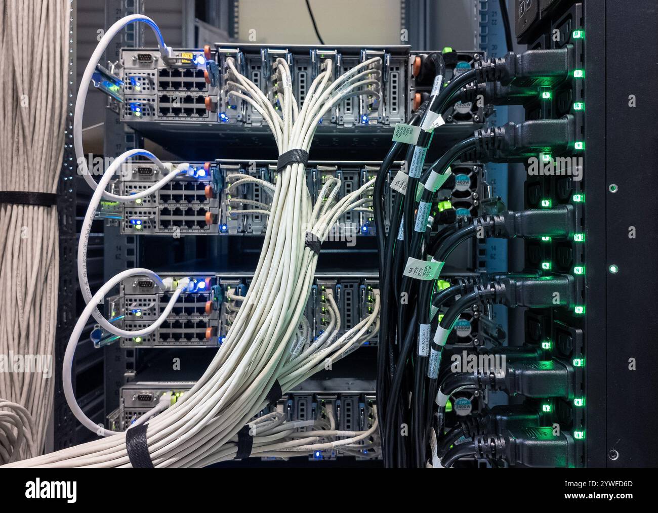 Data center equipment with organized cabling and illuminated ports ...