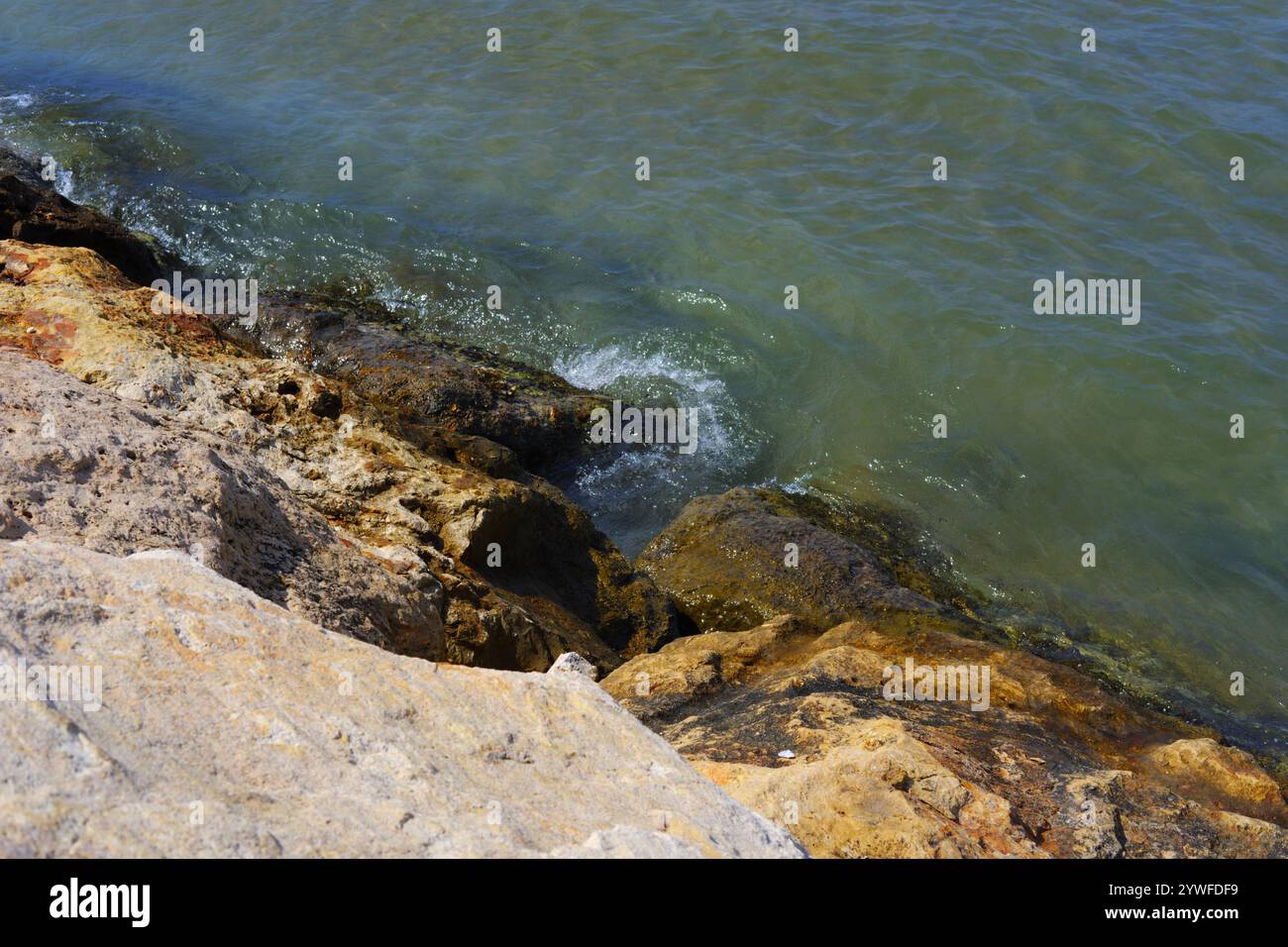 Waves bursting over rocks hi-res stock photography and images - Alamy
