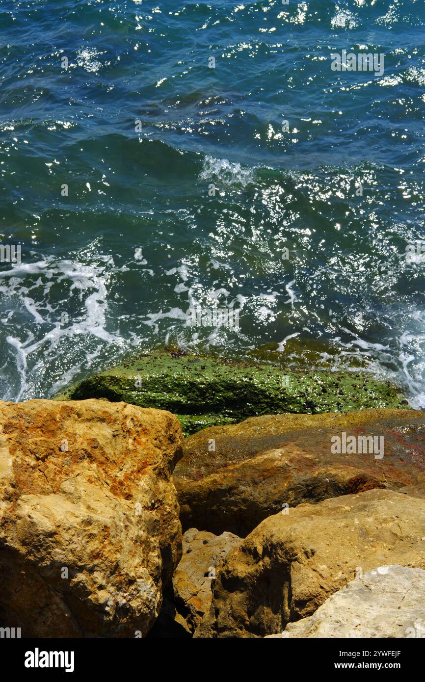 Wave bursting on coastal rocks hi-res stock photography and images - Alamy